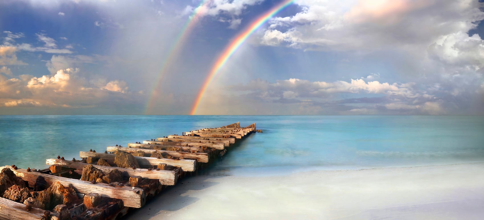 Photos of rainbows on beaches - VAST